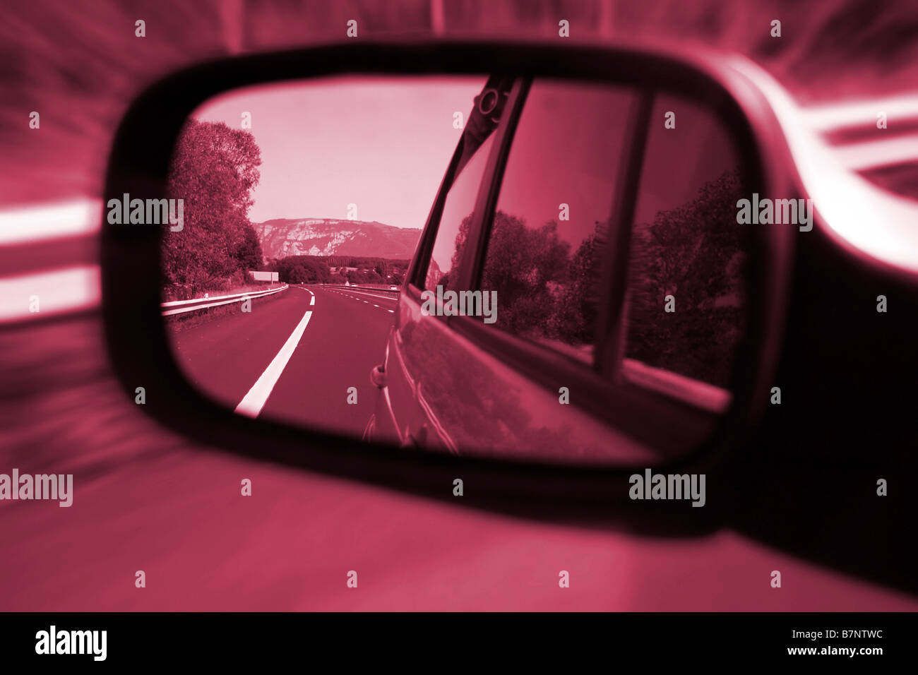 Road seen in a car mirror Stock Photo - Alamy