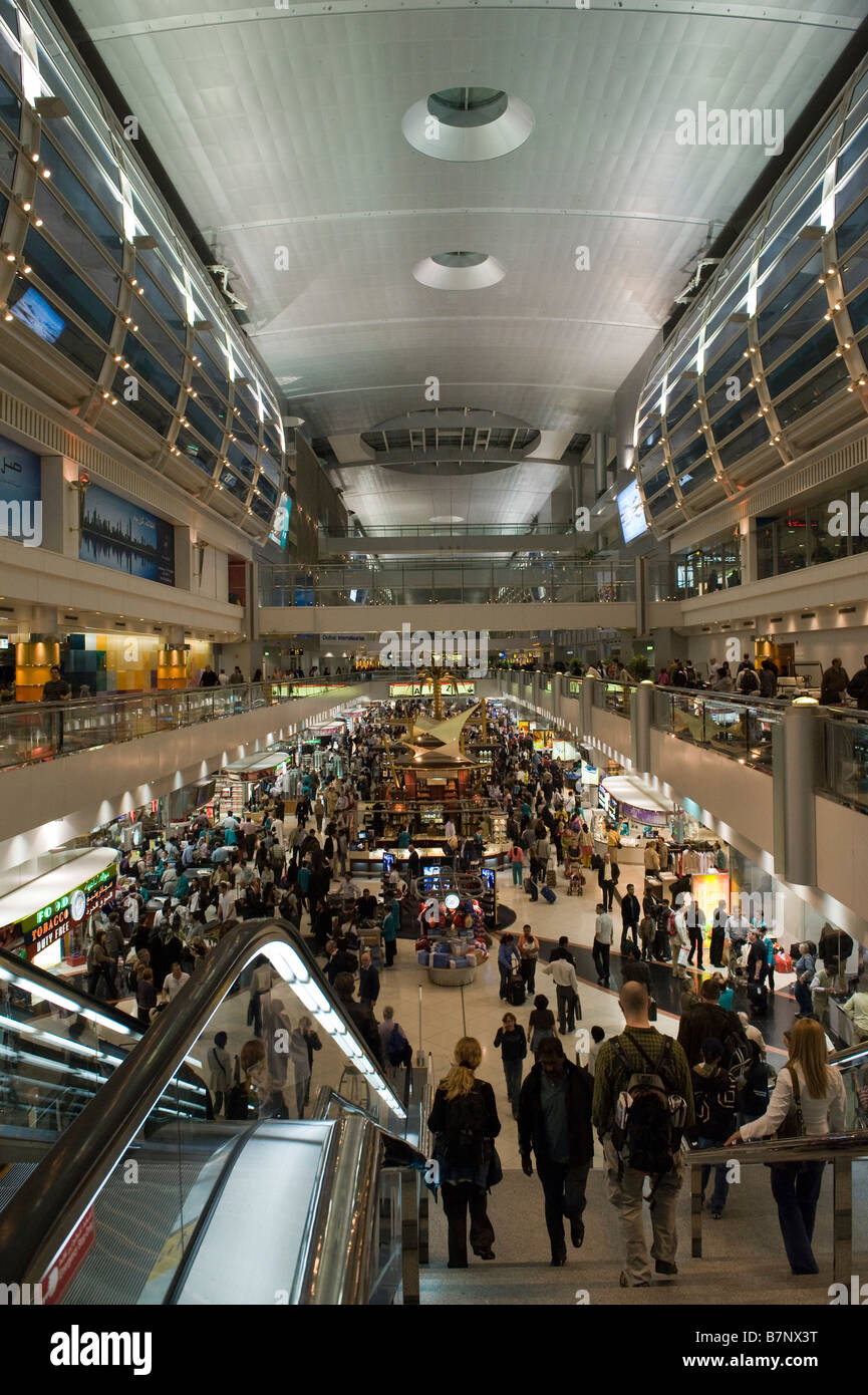 The vast international transit lounge at Dubai International Airport ...