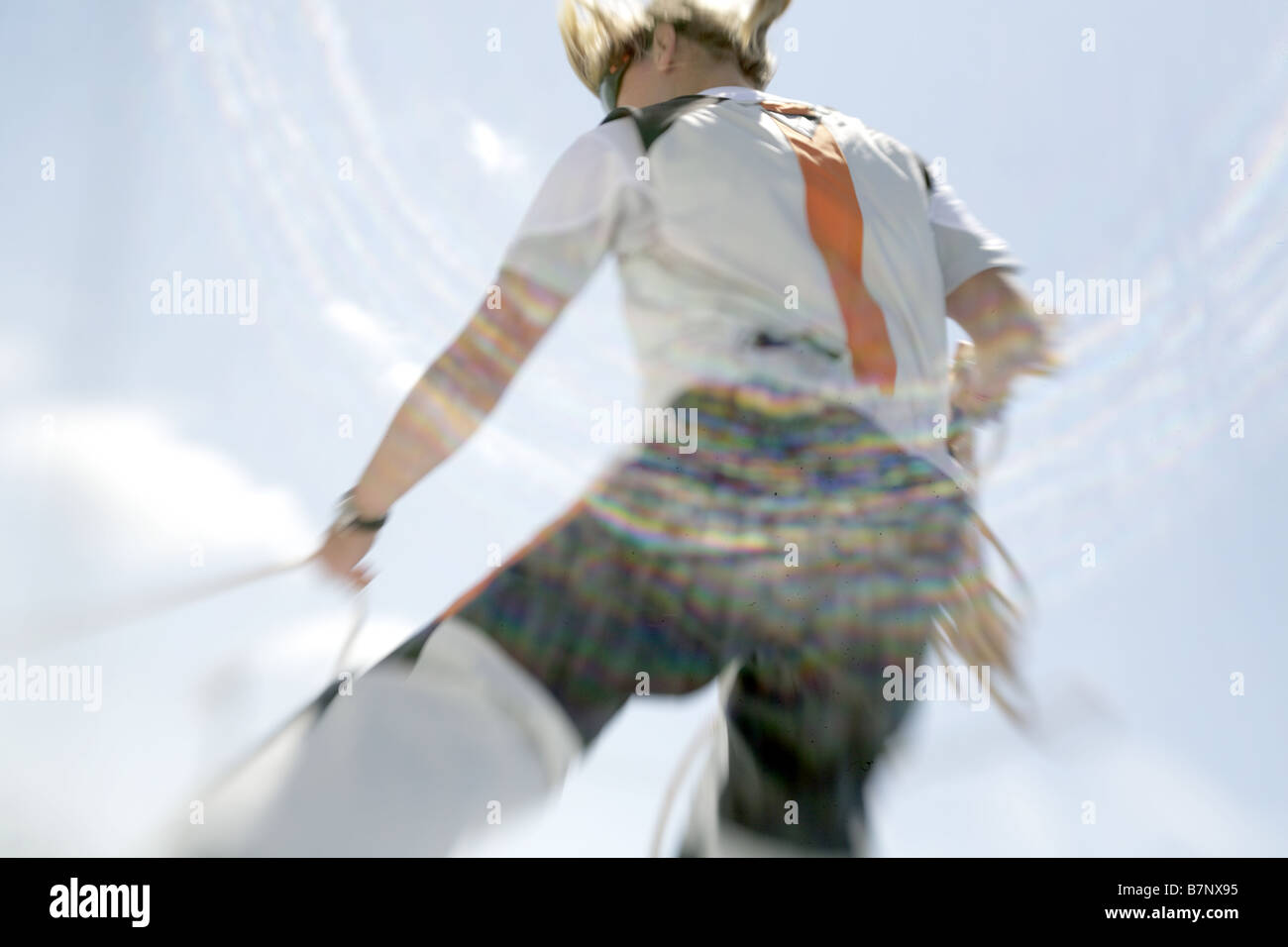 solo female sailor on board a racing yacht Stock Photo - Alamy