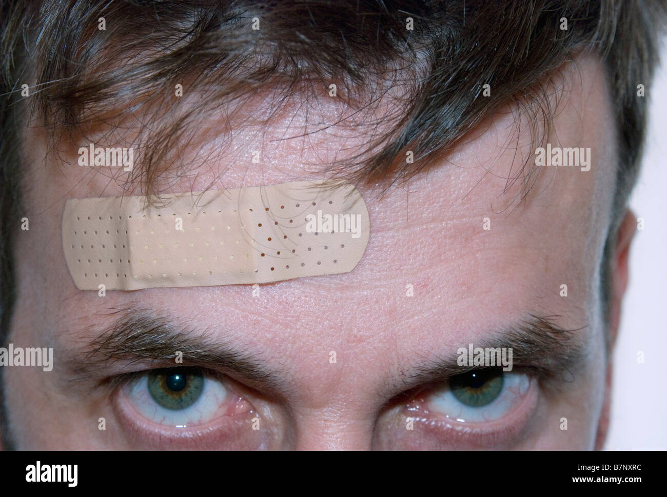 Forehead band aid hi-res stock photography and images - Alamy