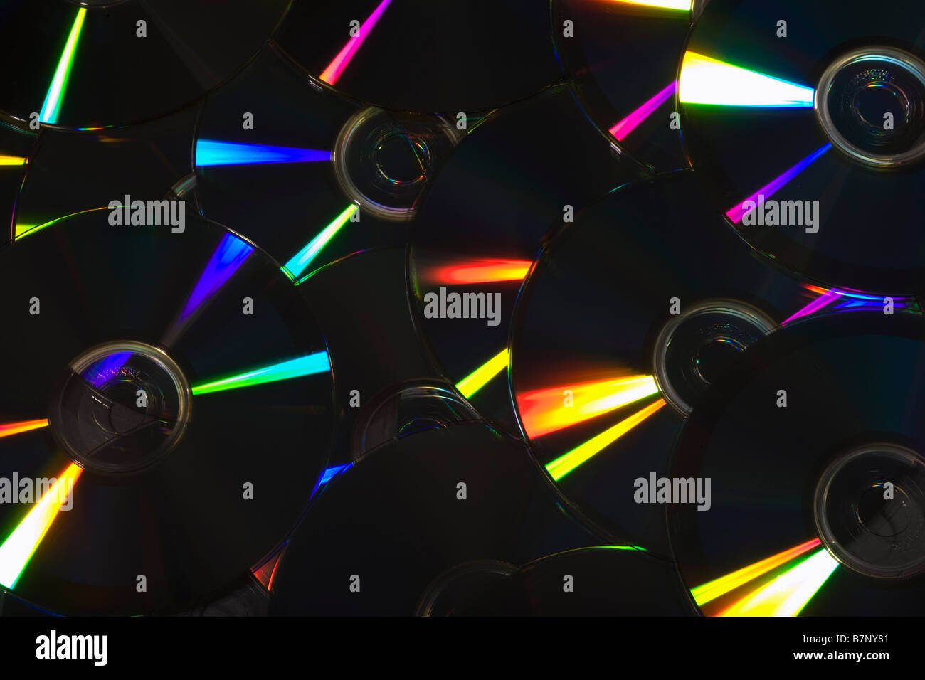 CDs in a high contrast colourful overlapping arrangement with hard ...