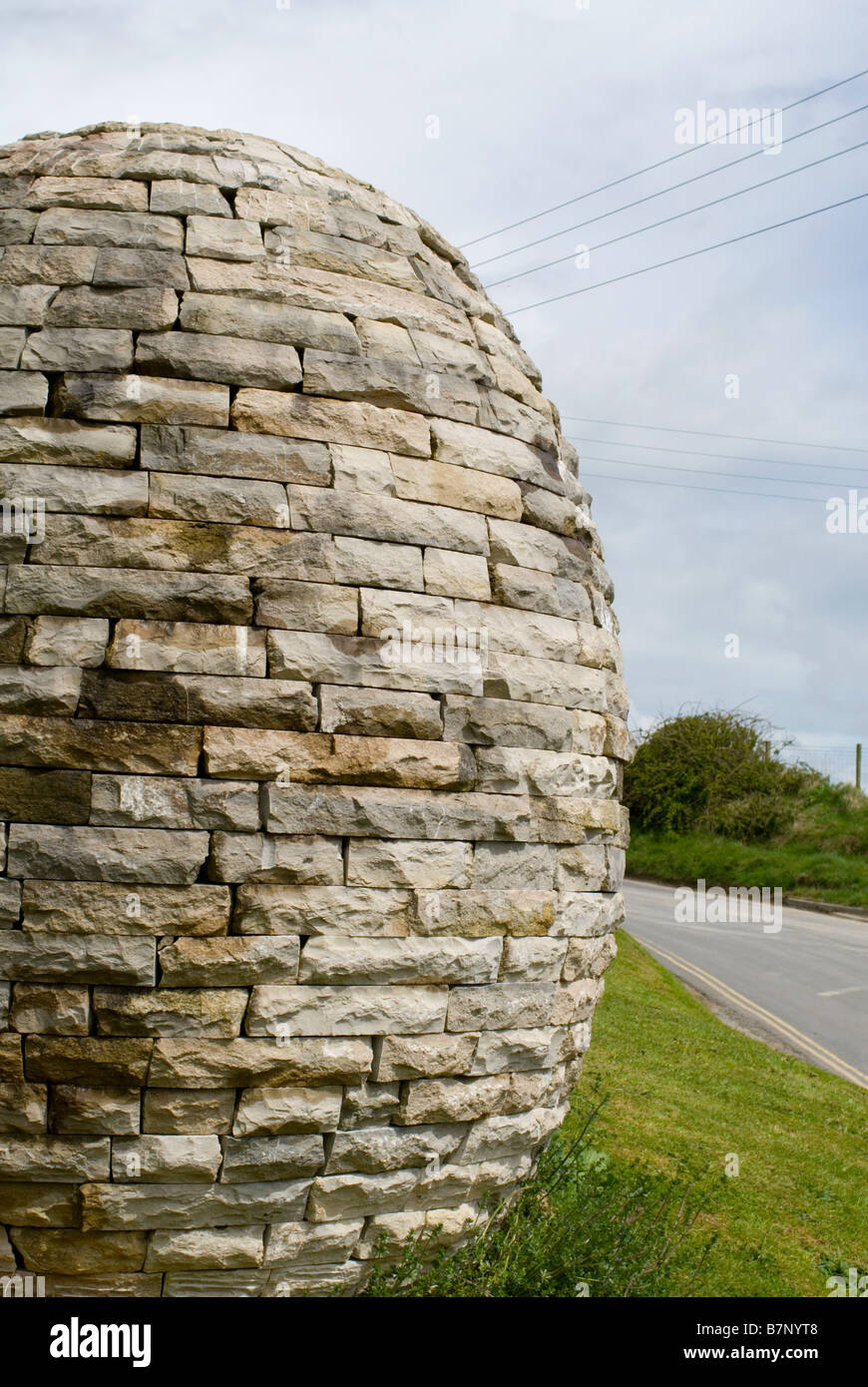 An egg shaped stone sculpture an advertisement for a local dry stone ...