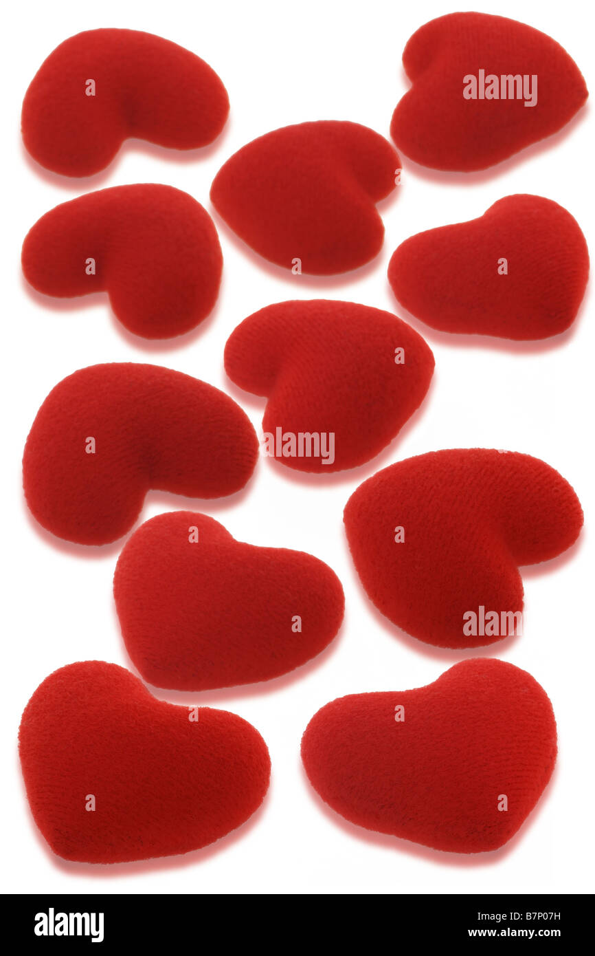 Red velvet hearts background on white background Stock Photo - Alamy