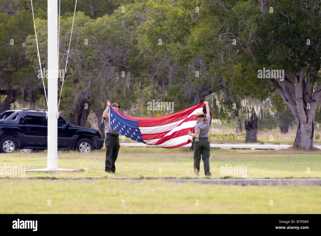park rangers folding the stars and stripes united states flag , at ...