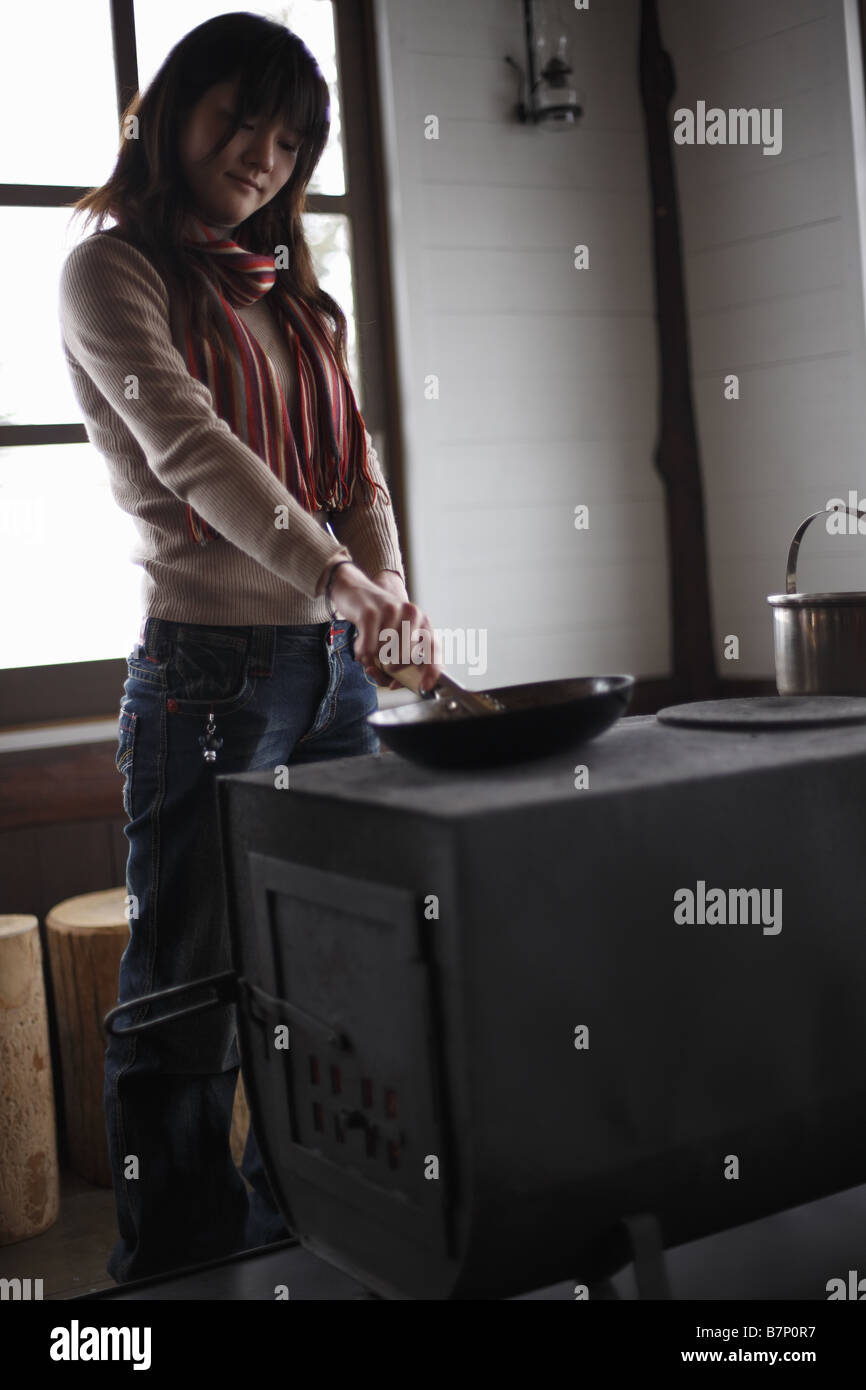 Retro woman cooking hi-res stock photography and images - Alamy