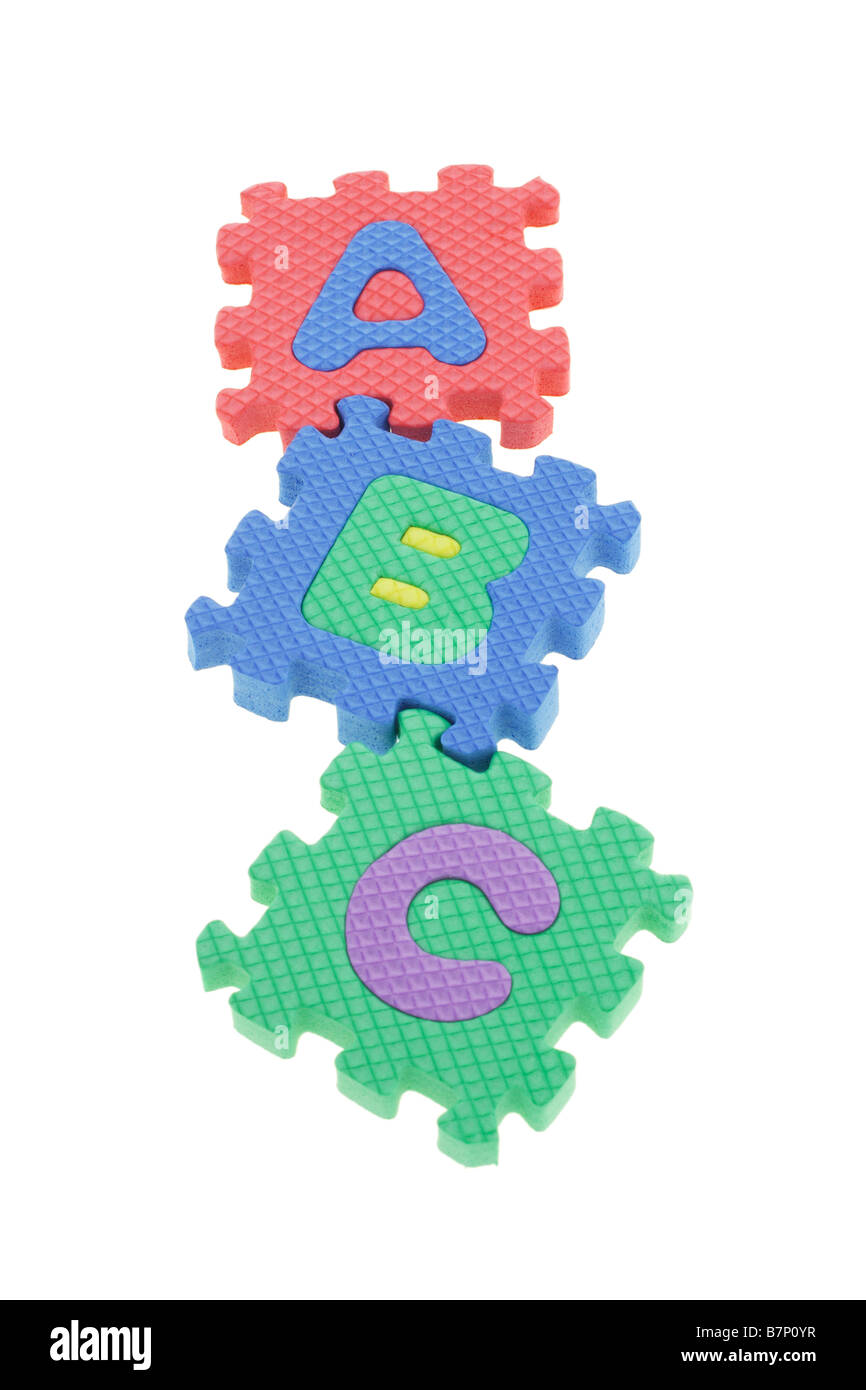 Colorful puzzle blocks arranged on white background Stock Photo - Alamy