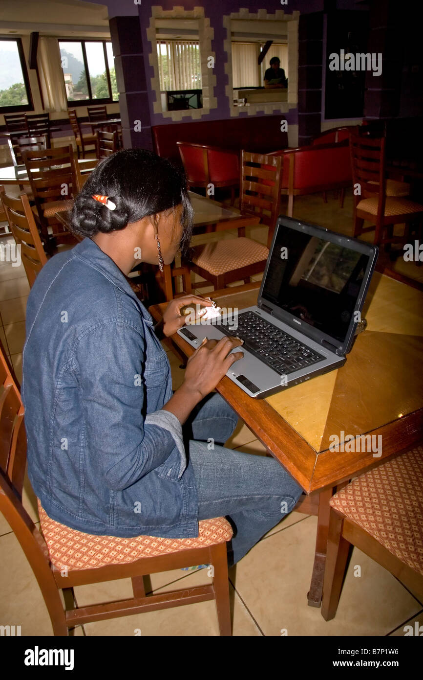 Woman using laptop computer Yaoundé Cameroon West Africa Stock Photo - Alamy