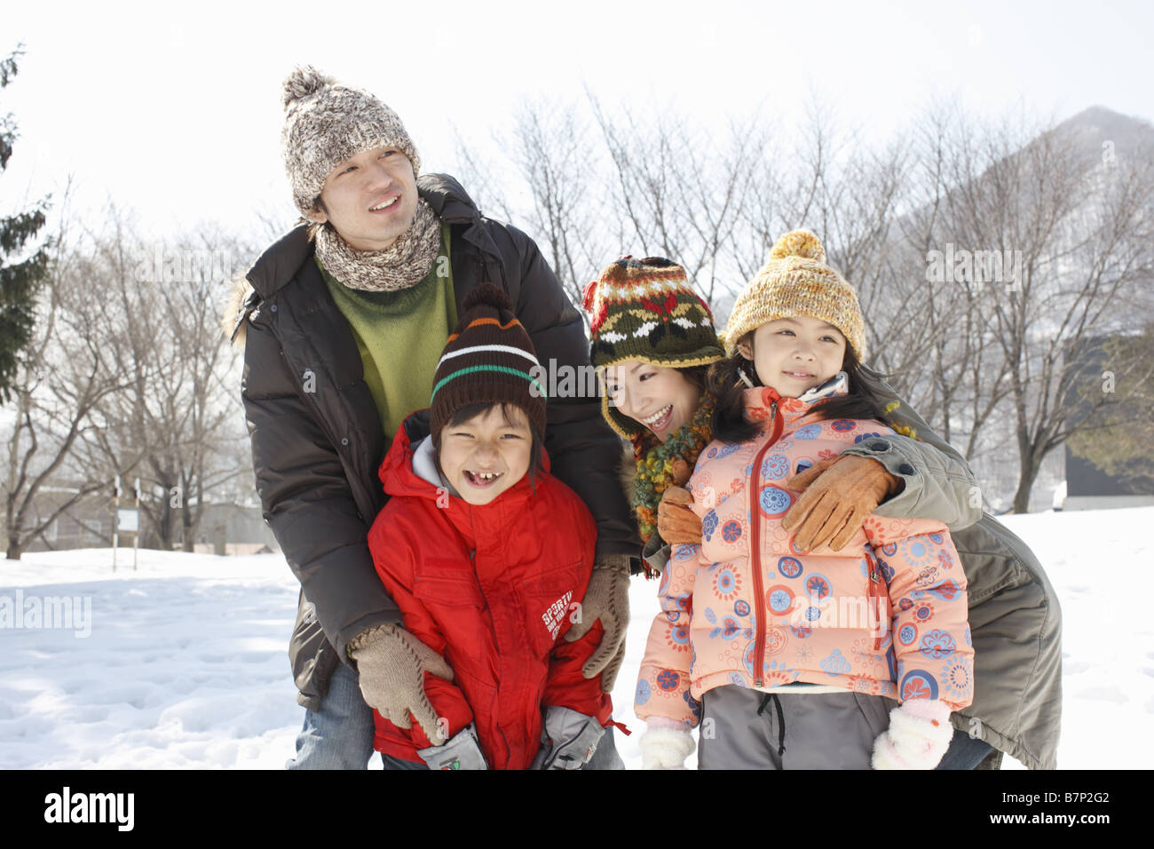 Family in winter Stock Photo - Alamy