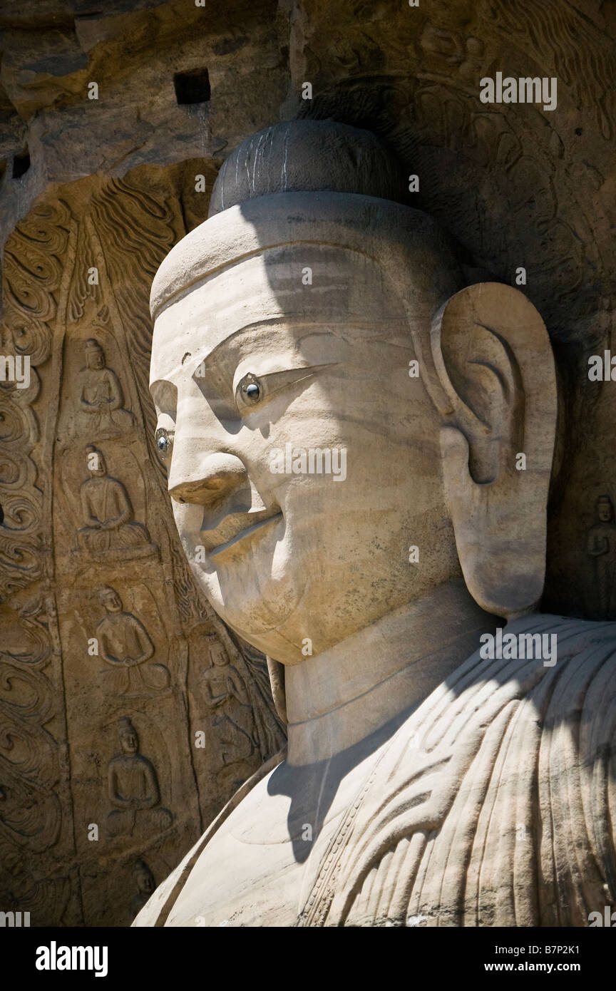The face of the famous Stone Buddha statue in Datong, China Stock Photo ...