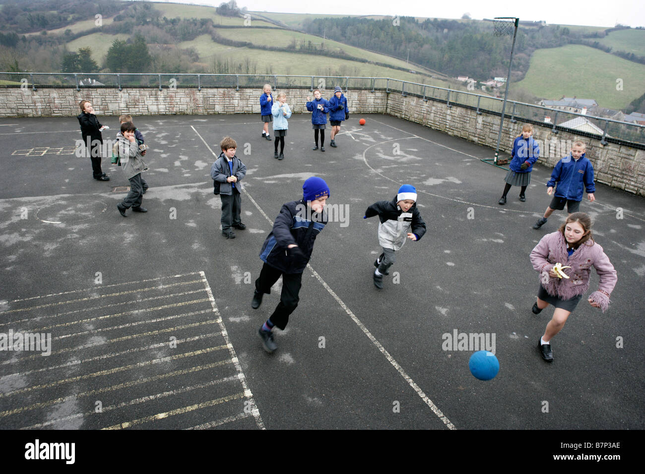 primary school pupils at break time in school playground Stock Photo ...