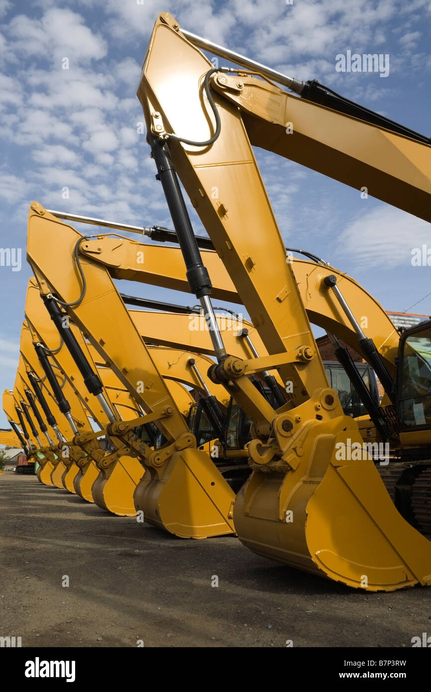 row of excavators Stock Photo - Alamy