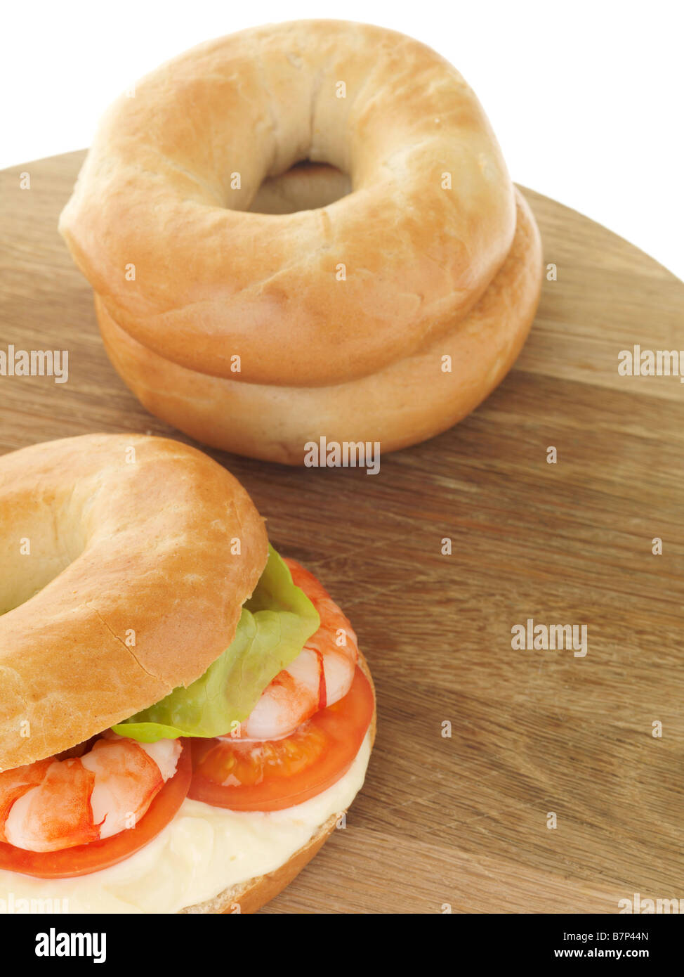 Freshly Prepared Fresh Prawn And Salad Bagel Isolated Against A White ...
