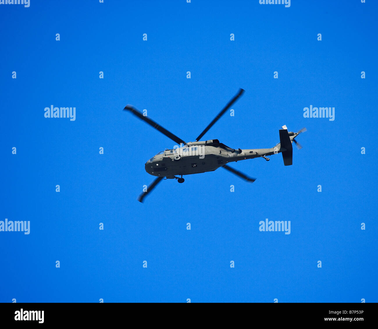 A helicopter flying overhead Stock Photo - Alamy
