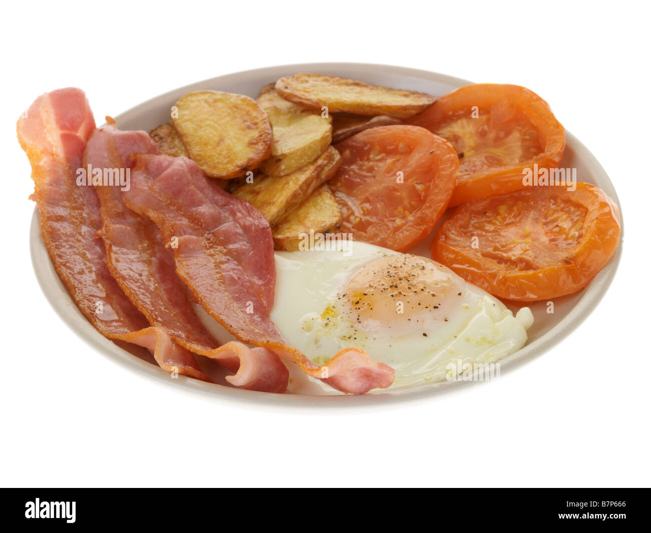 Traditional Full English Breakfast Of Eggs Bacon Tomatoes and Fried ...
