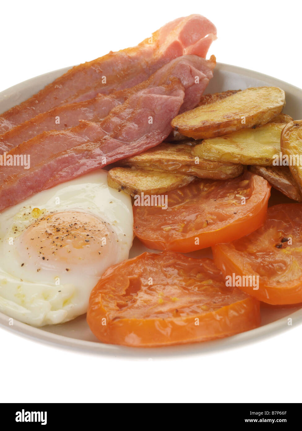 Traditional Full English Breakfast Of Eggs Bacon Tomatoes and Fried ...