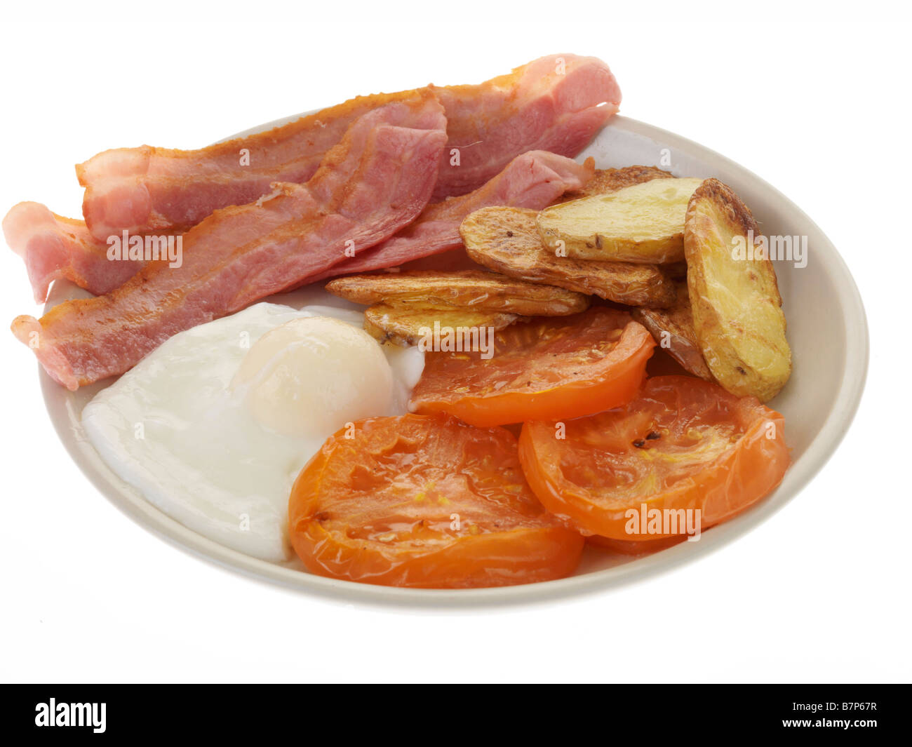 Traditional Full English Breakfast Of Eggs Bacon Tomatoes and Fried ...