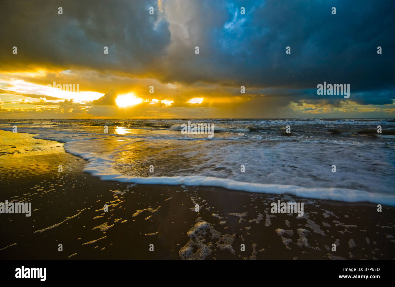 sunset on the beach in holland the netherlands Stock Photo - Alamy