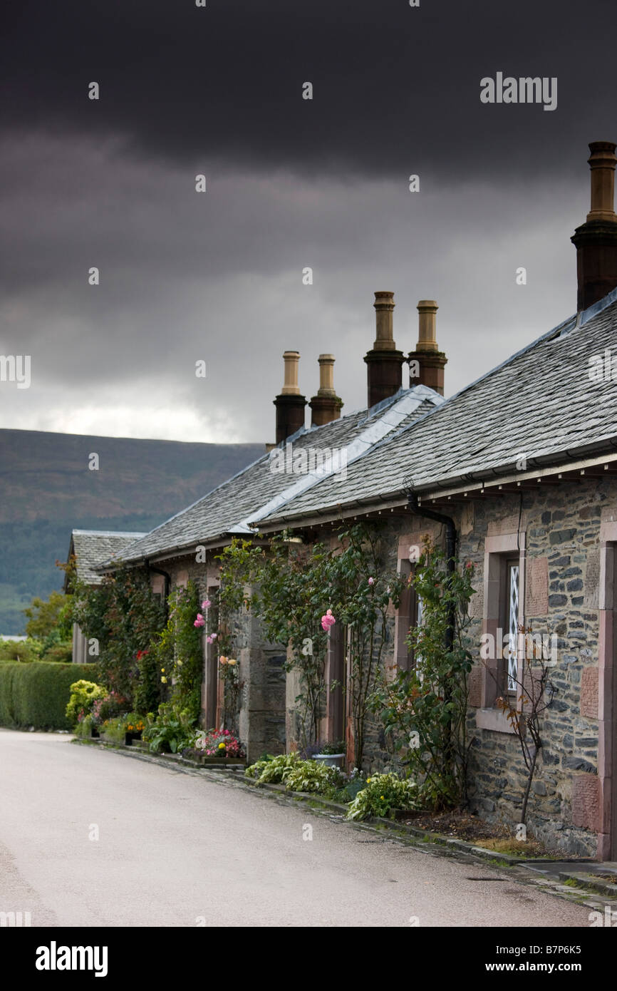 Buildings under storm clouds, Scotland Stock Photo - Alamy