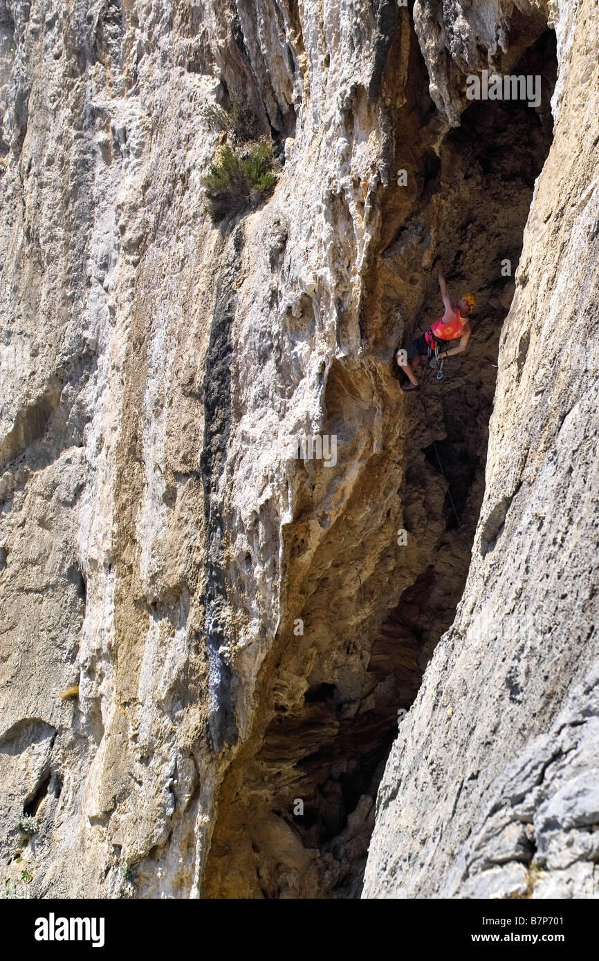 Sport climbing up the steep cave of "Oetida" at Iliada in Kalymnos ...