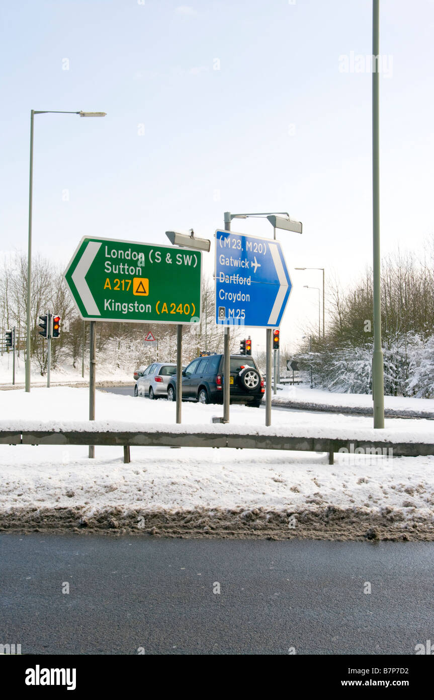 Road Signs In The Snow at Junction 8 M25 A217 uk motorway traffic road ...