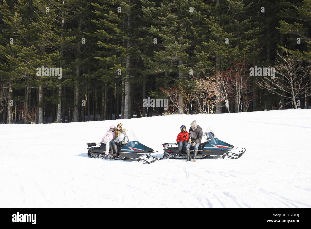 Two men on snowmobile on hi-res stock photography and images - Alamy
