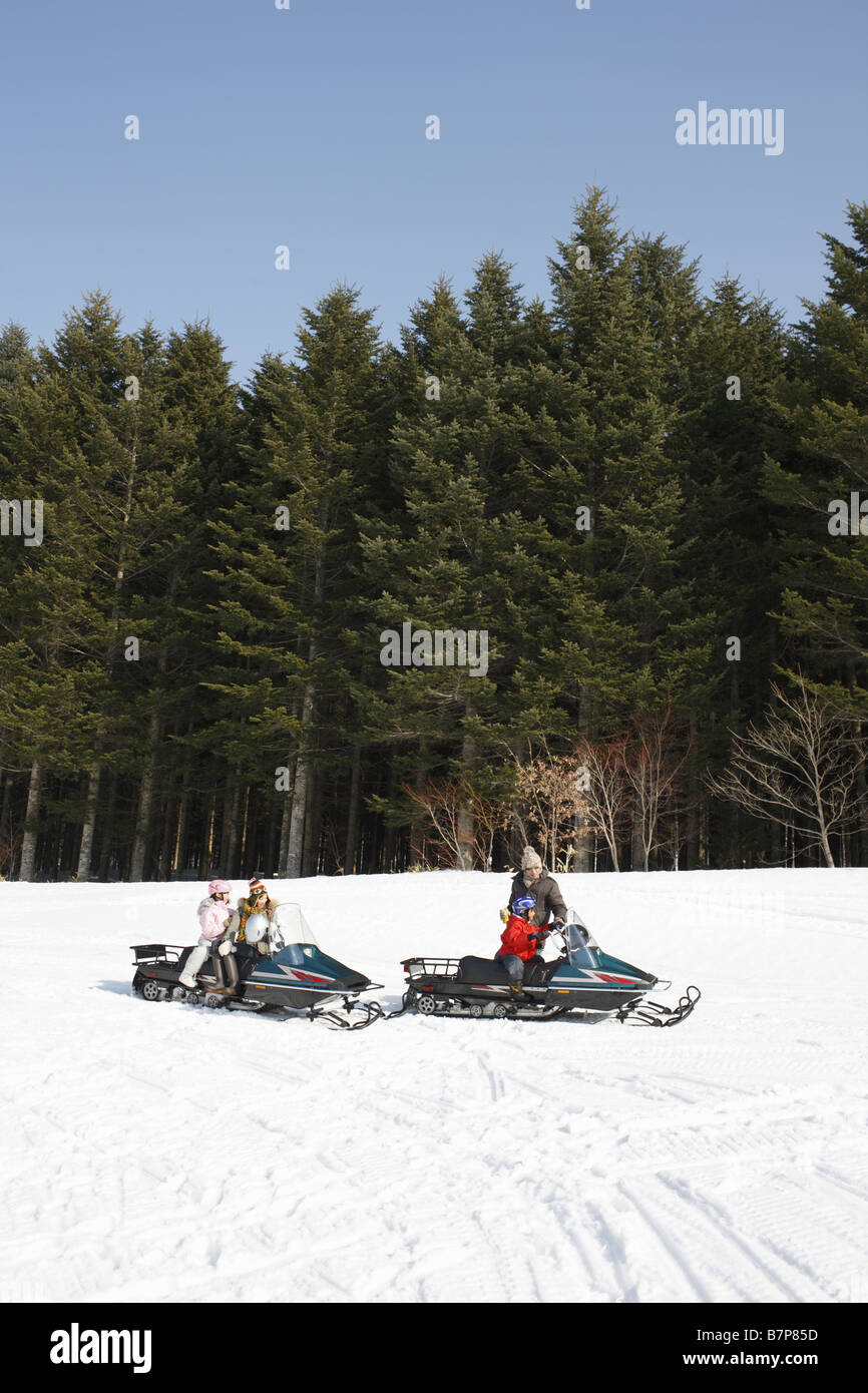 Two people riding snowmobile hi-res stock photography and images - Alamy