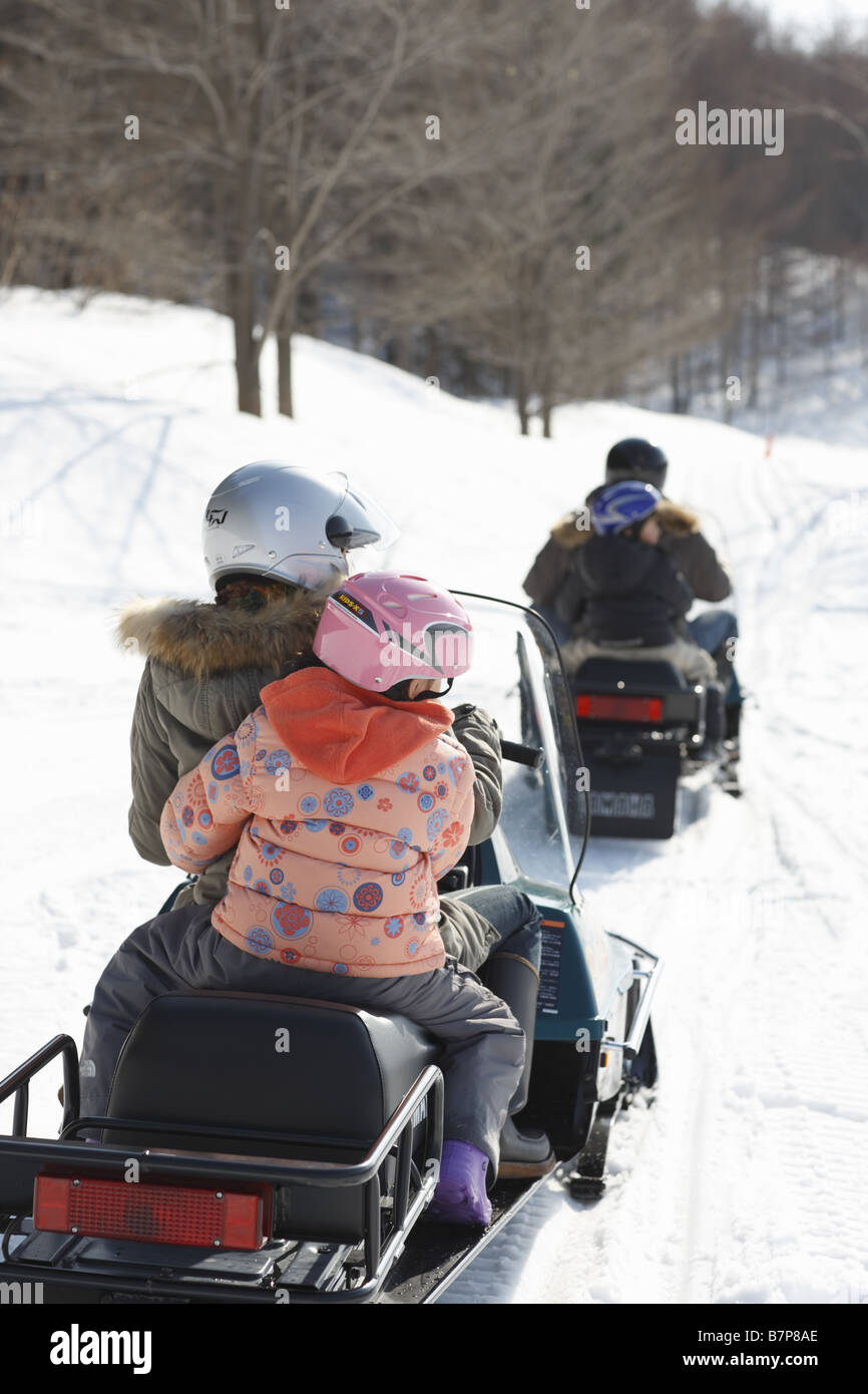 Two men on snowmobile on hi-res stock photography and images - Alamy