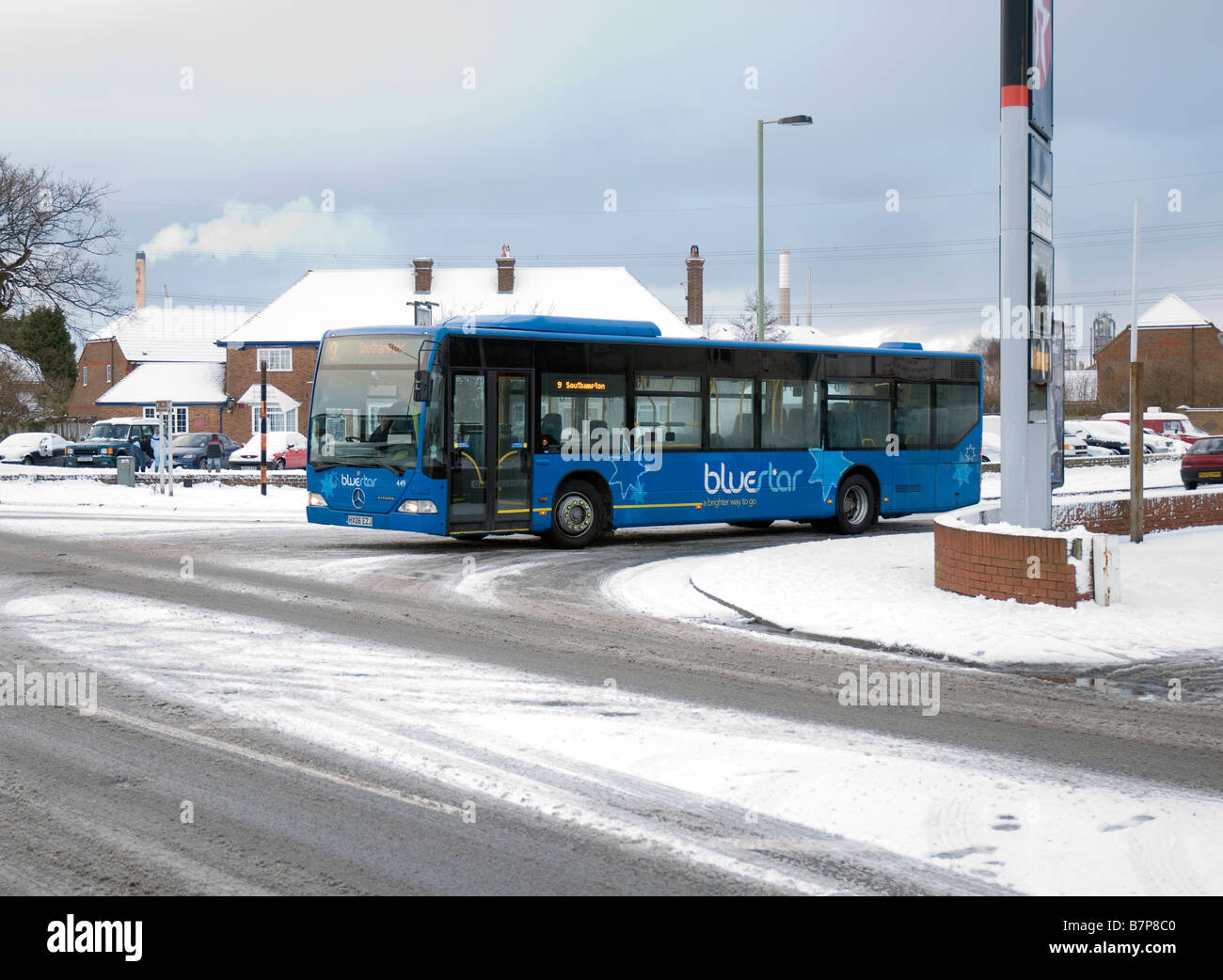 Solent Blue Line Bus on snowy road in Blackfield 2009 Stock Photo - Alamy