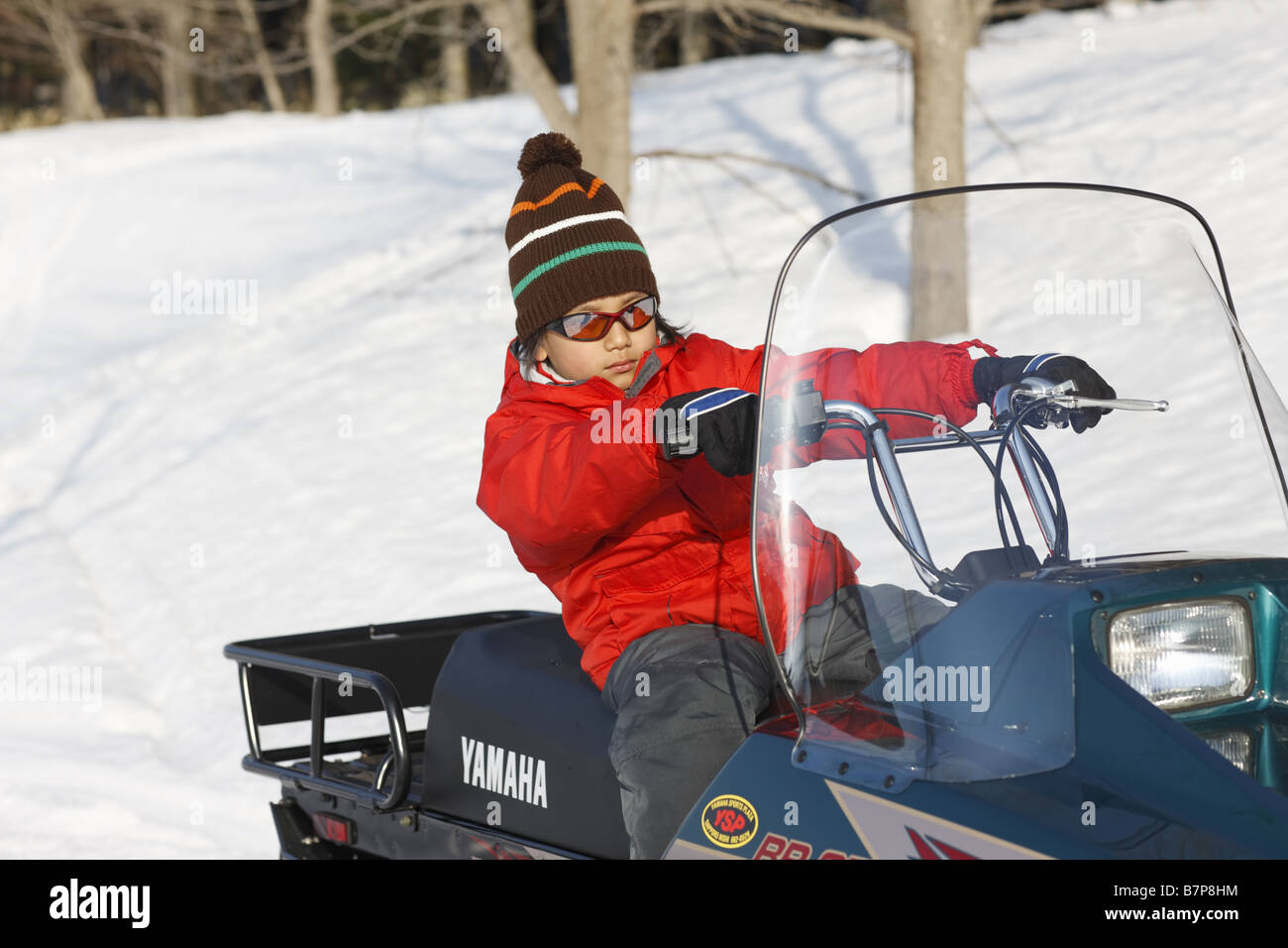 Person on snowmobile hi-res stock photography and images - Alamy