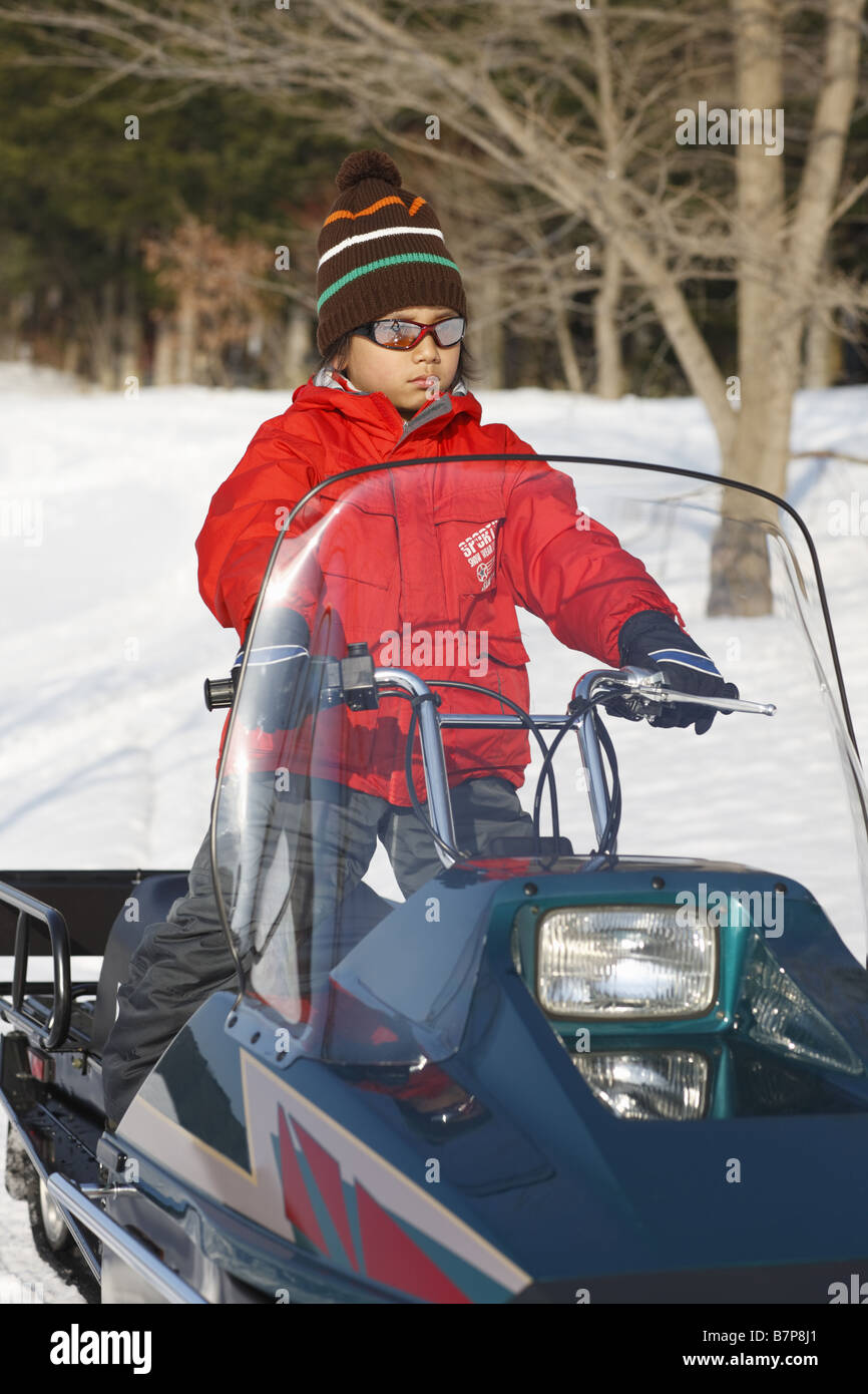 Person on snowmobile hi-res stock photography and images - Alamy