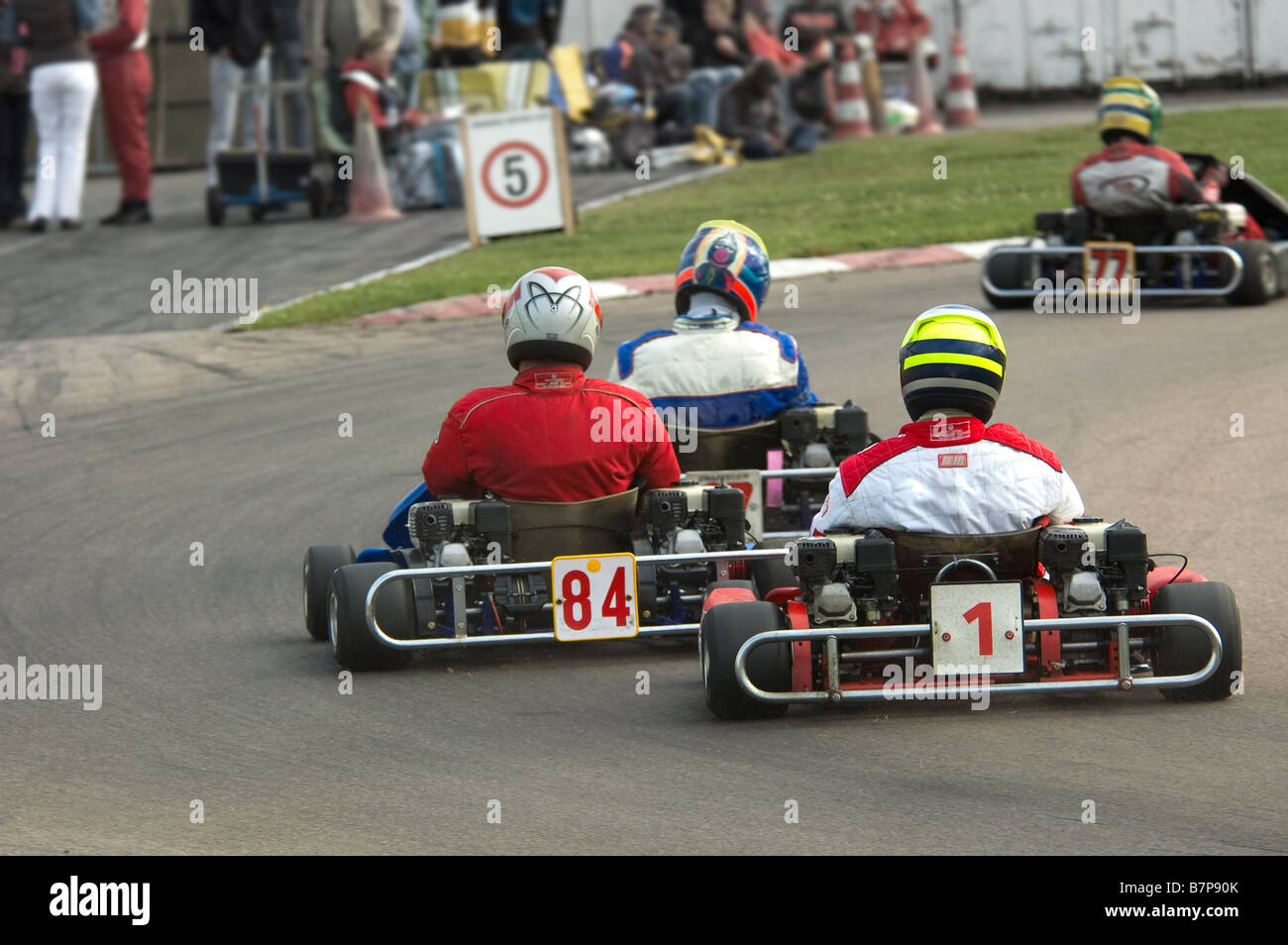 go kart racing on circuit Stock Photo - Alamy