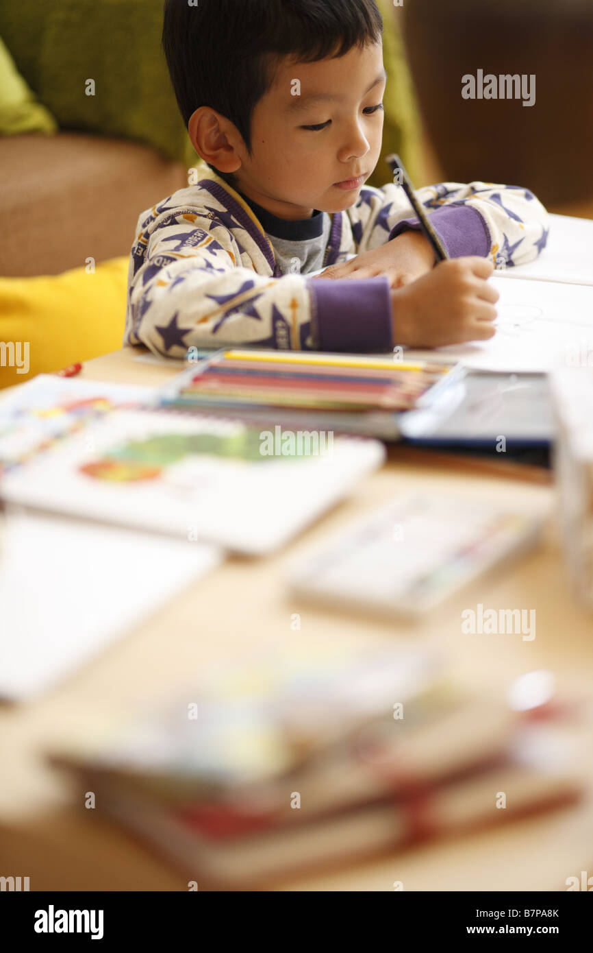 Boy doing art hi-res stock photography and images - Alamy