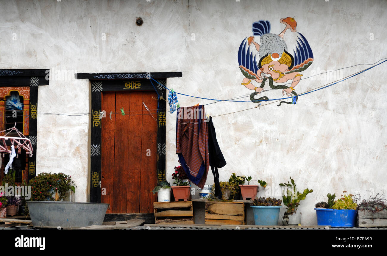 Representation of the immortal Garuda with a snake in his beak painted ...