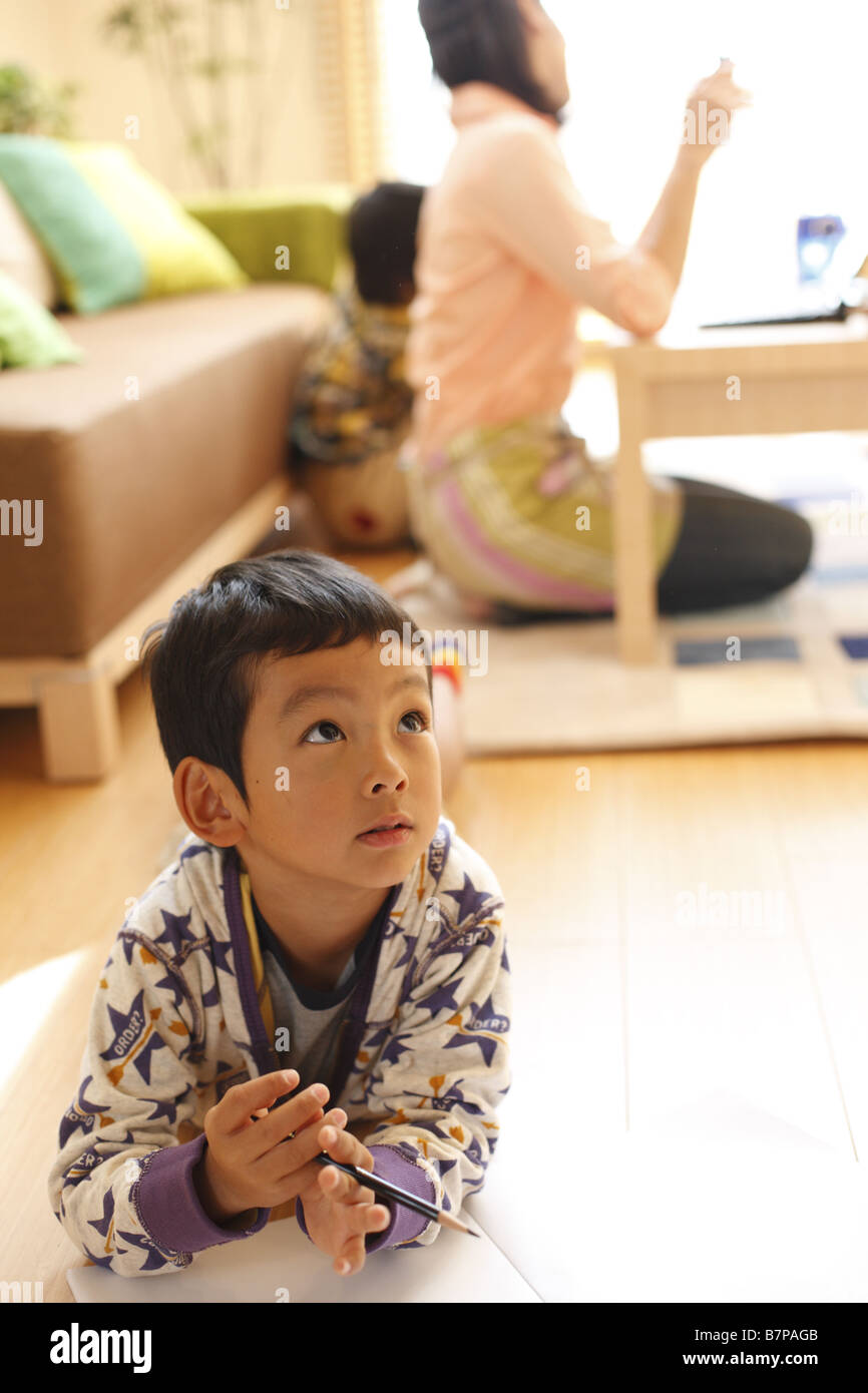 A boy looking up Stock Photo - Alamy