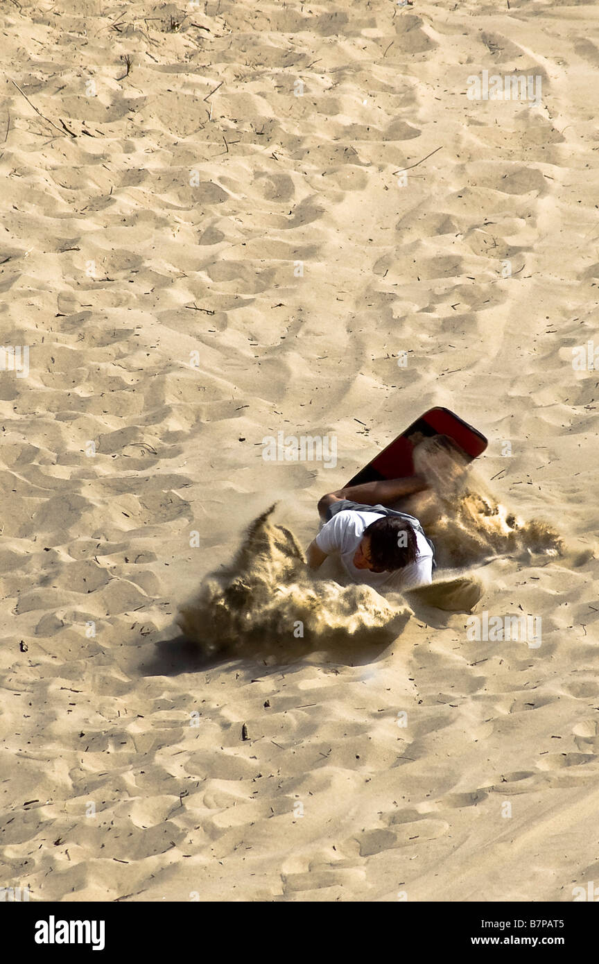 Falling sandboarder on the Oregon dunes Stock Photo - Alamy