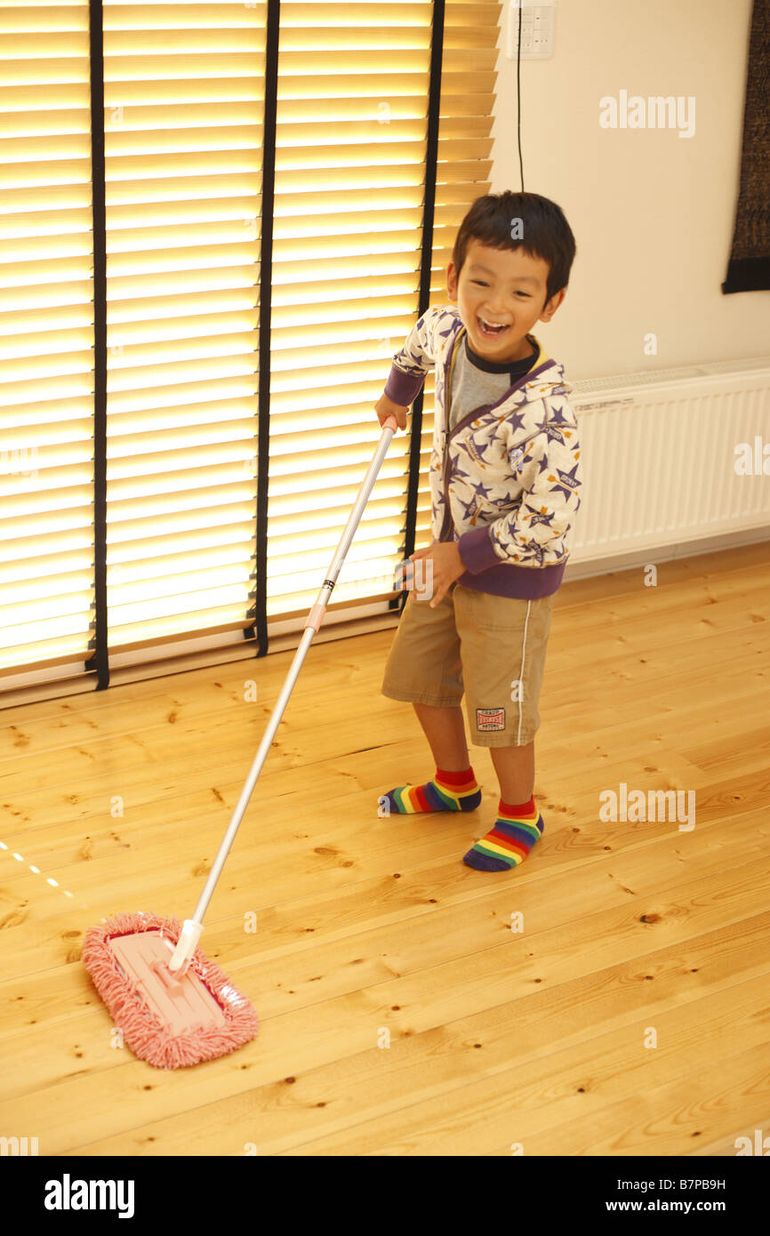 A boy cleaning Stock Photo - Alamy