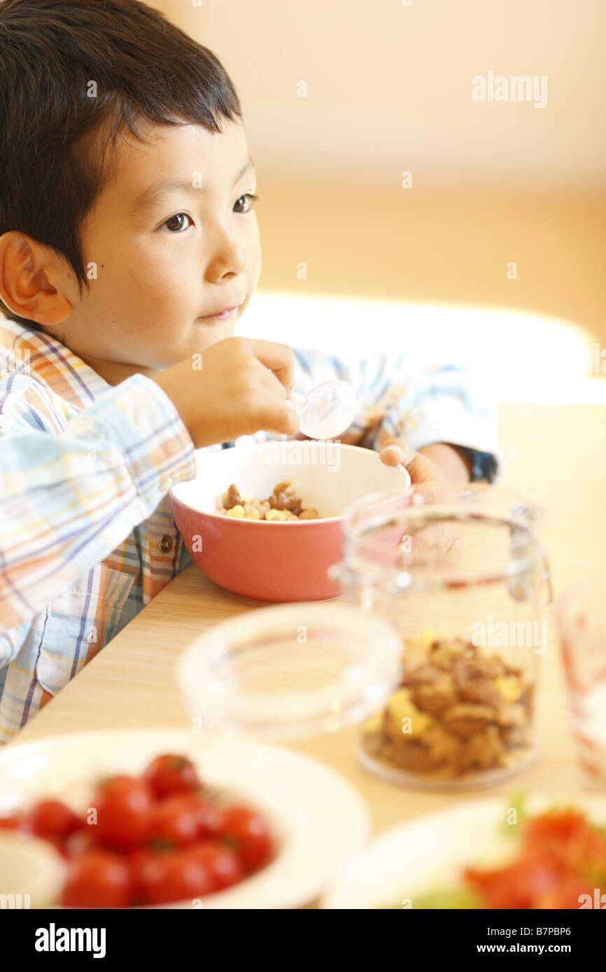 A boy having breakfast Stock Photo - Alamy