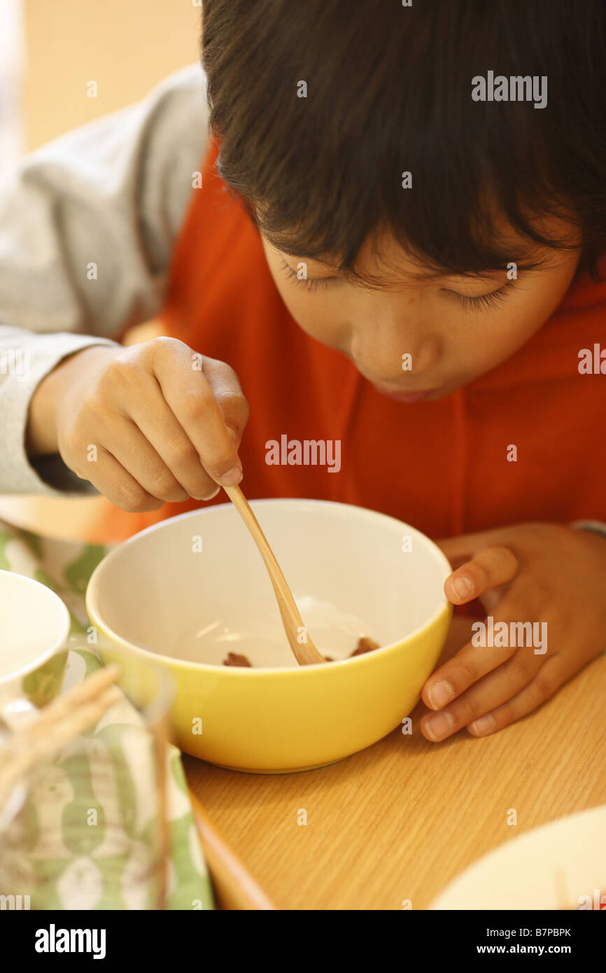A boy having breakfast Stock Photo - Alamy