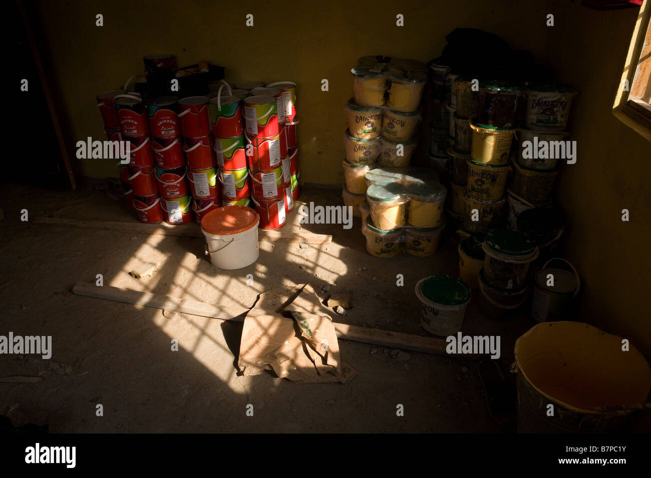 Paint buckets in a corner waiting to be used at the new Kroo Bay clinic ...