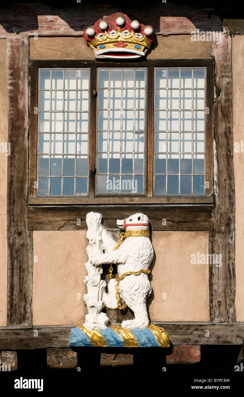 The Bear and ragged staff emblem outside the Lord Leycester Hospital in ...