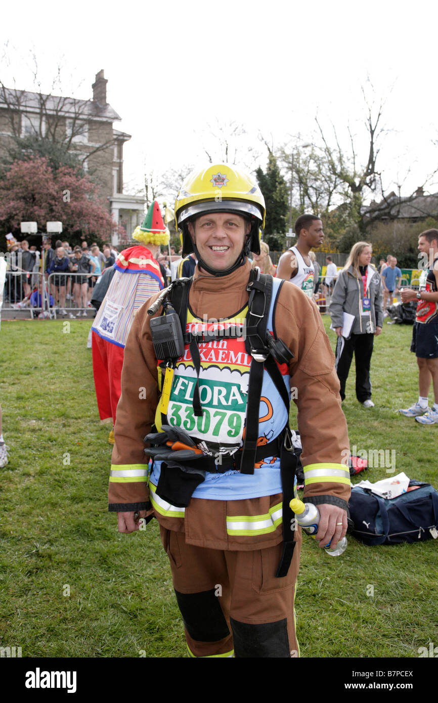 Fireman runner at the start of the London Marathon Stock Photo - Alamy