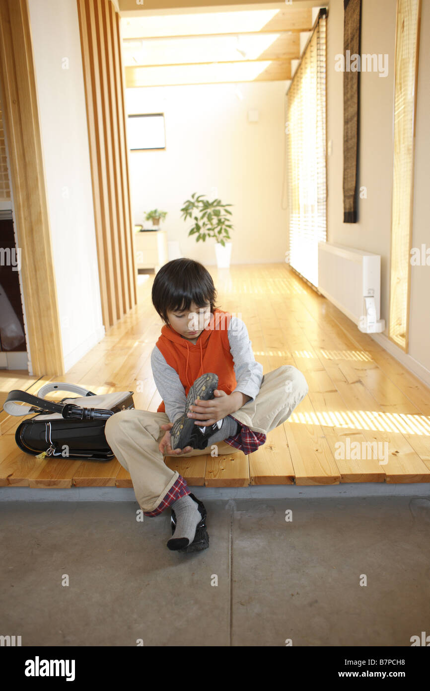 A boy coming home Stock Photo - Alamy