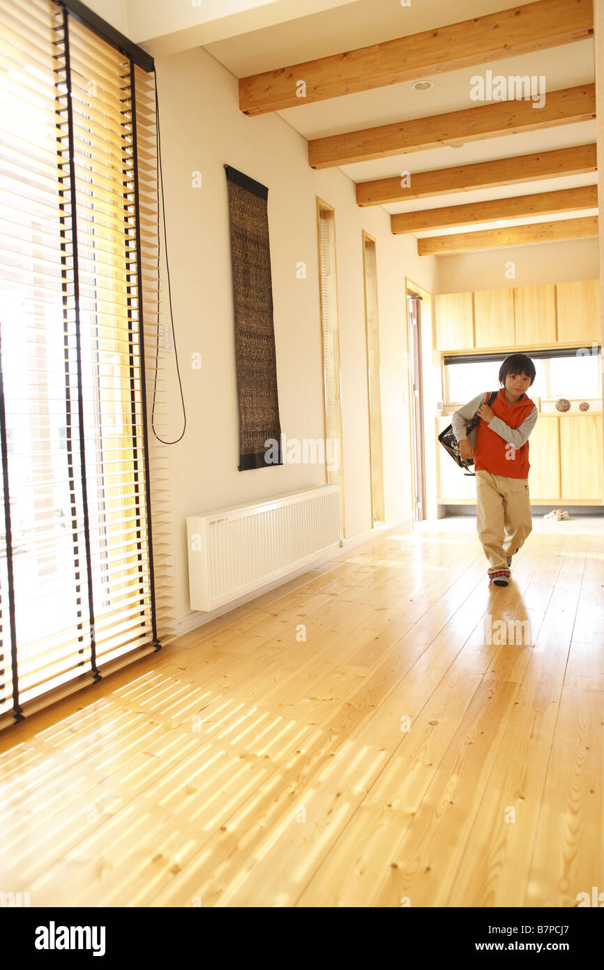 A boy coming home Stock Photo - Alamy