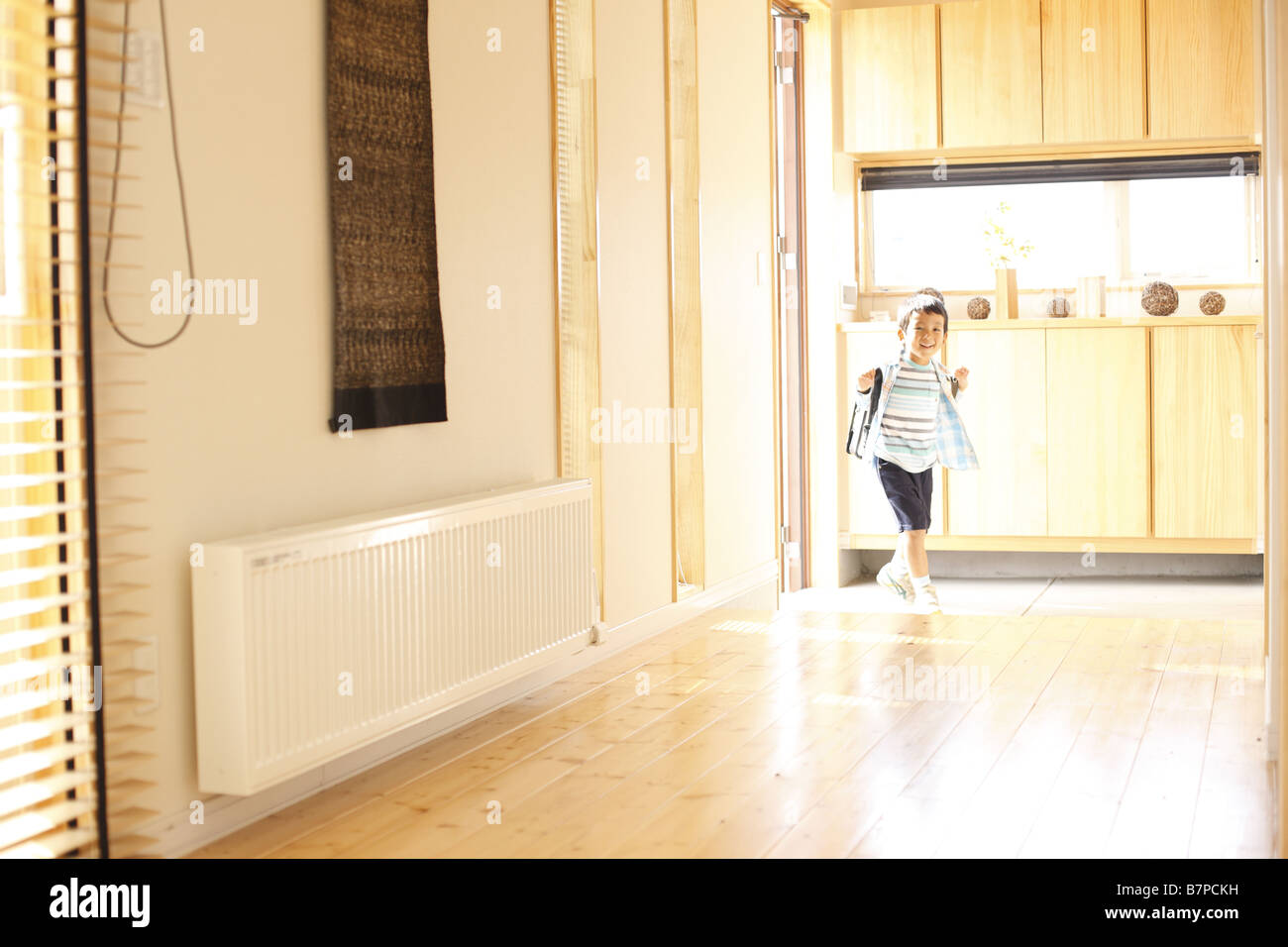 A boy coming home Stock Photo - Alamy