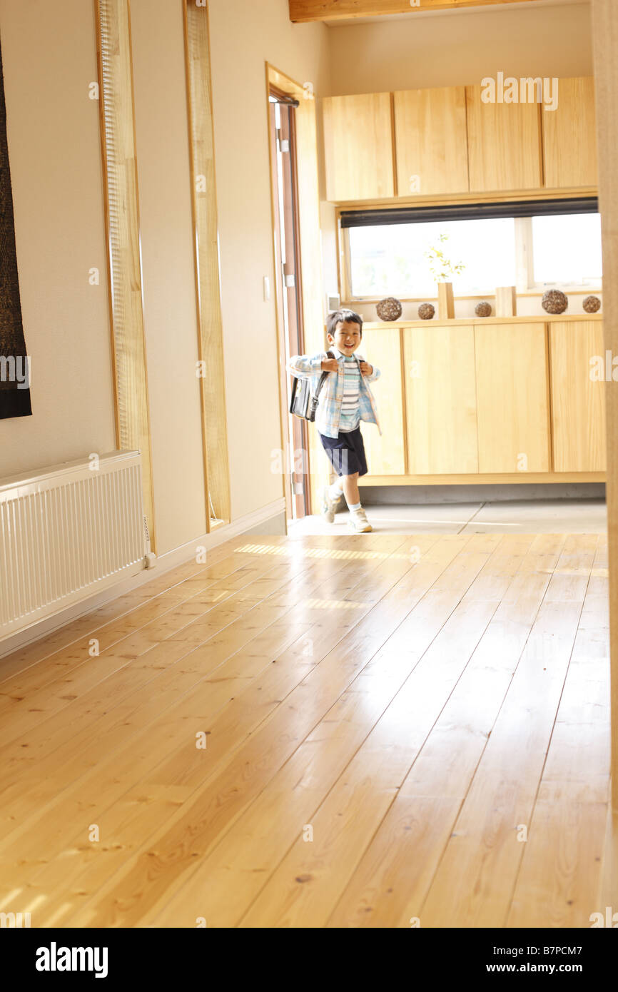 A boy coming home Stock Photo - Alamy