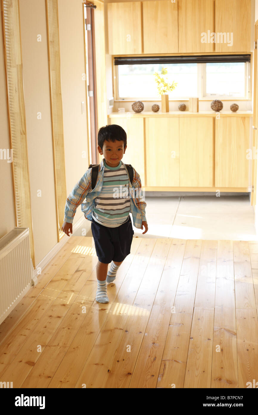 A boy coming home Stock Photo - Alamy