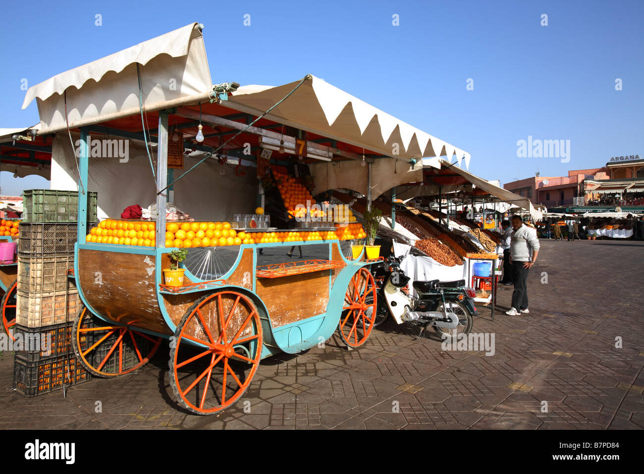 Orange cart in Djemaa el Fna square, Marrakech, Morocco Stock Photo - Alamy