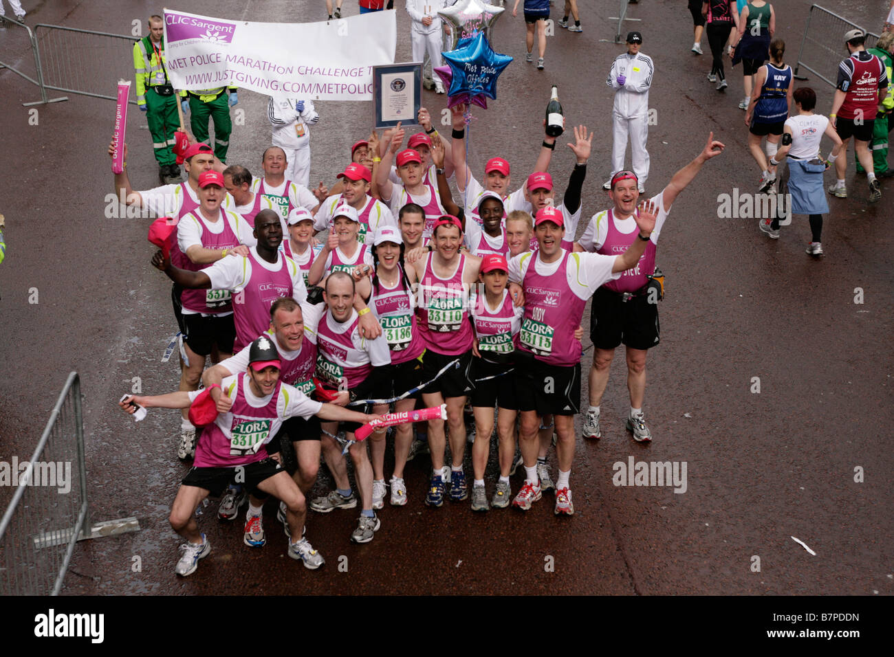 London Marathon Police runners chained together Stock Photo - Alamy