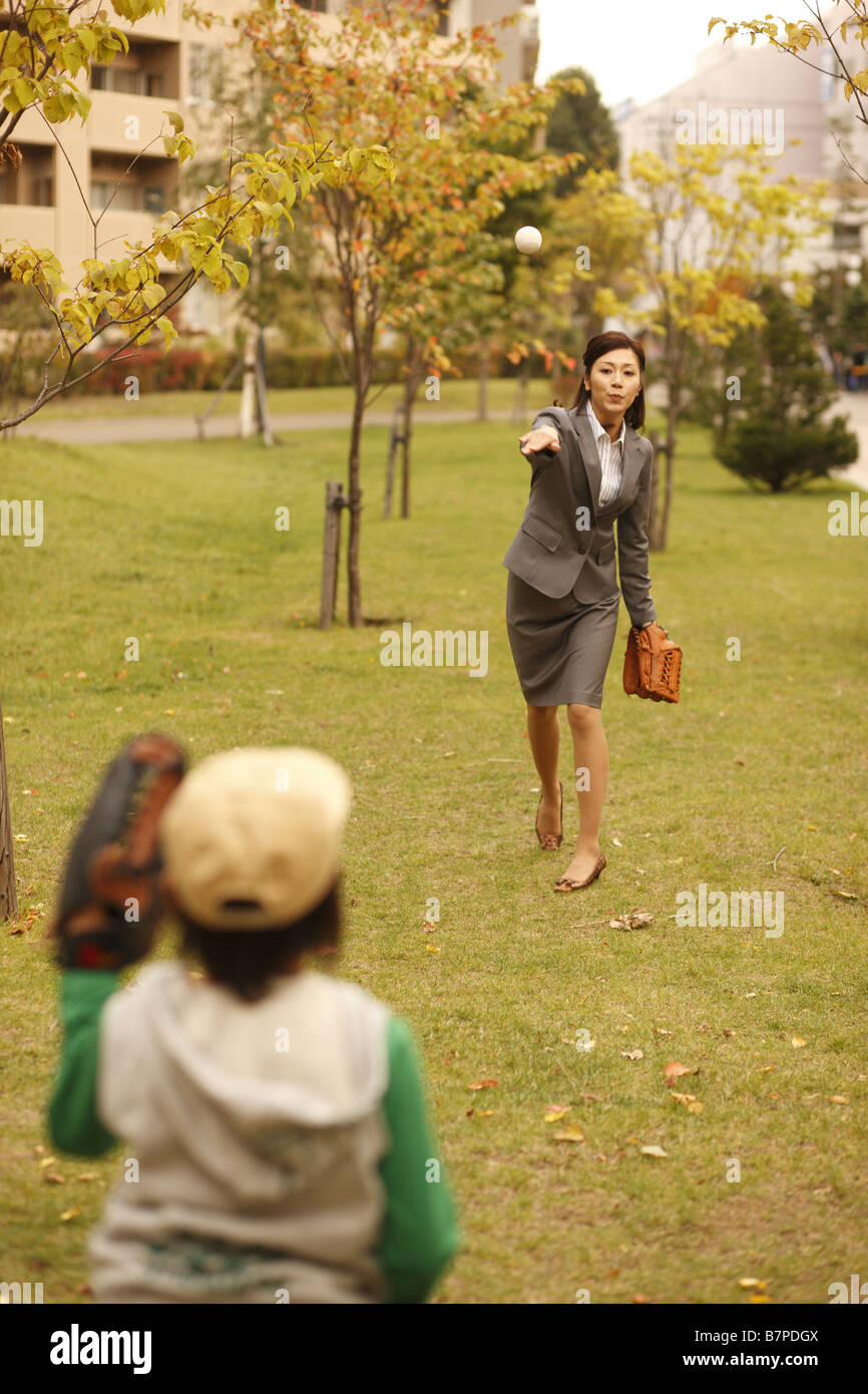 Mother and child playing catch Stock Photo - Alamy