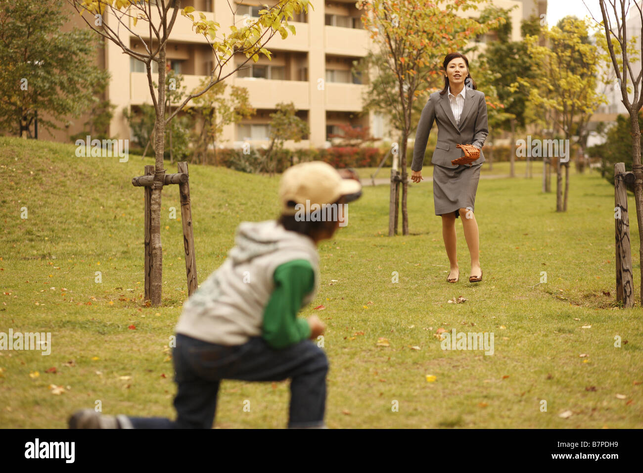 Mother and child playing catch Stock Photo - Alamy